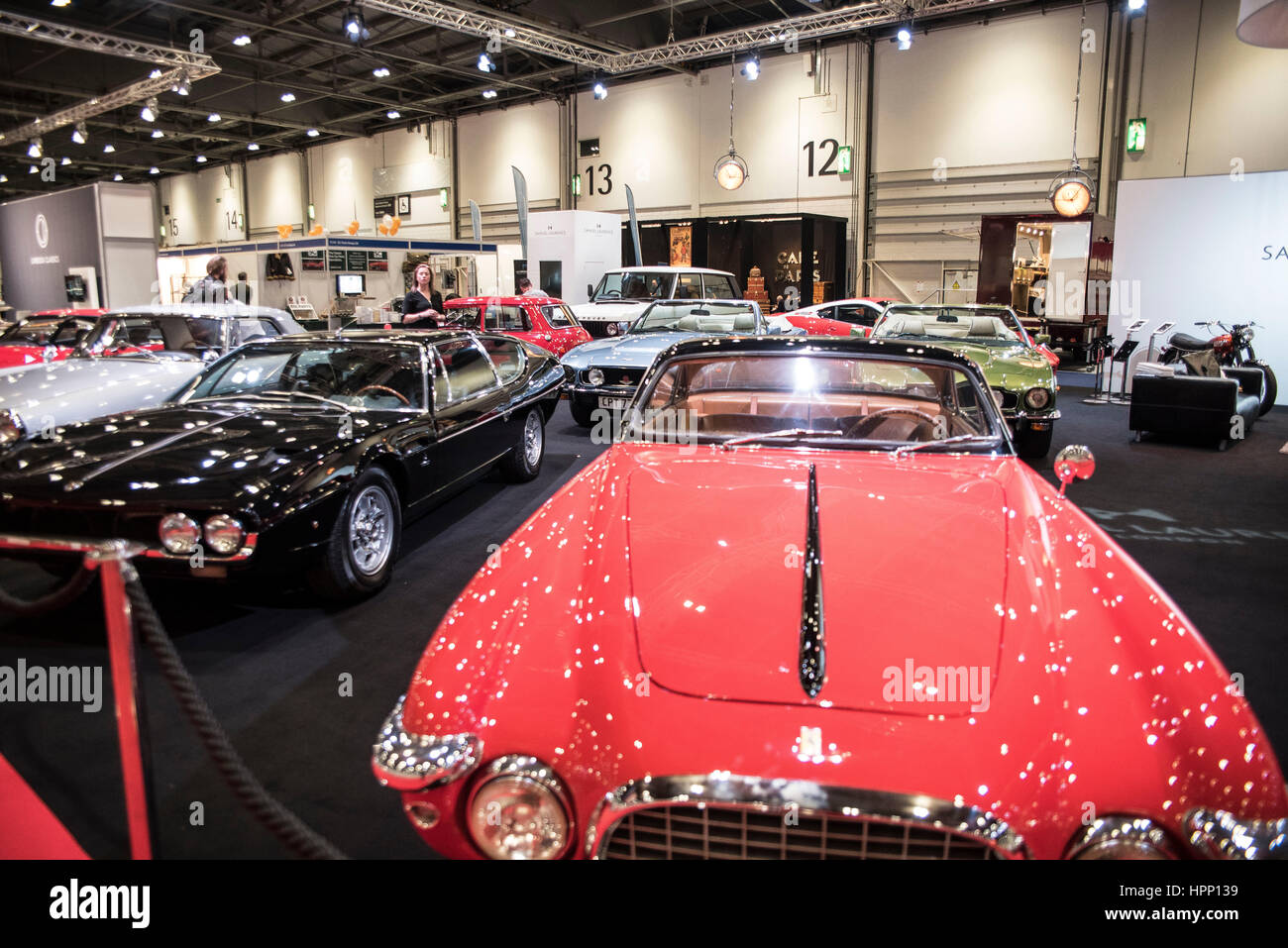 London, UK. 23rd Feb, 2017. Vintage and new sports cars are displayed ...