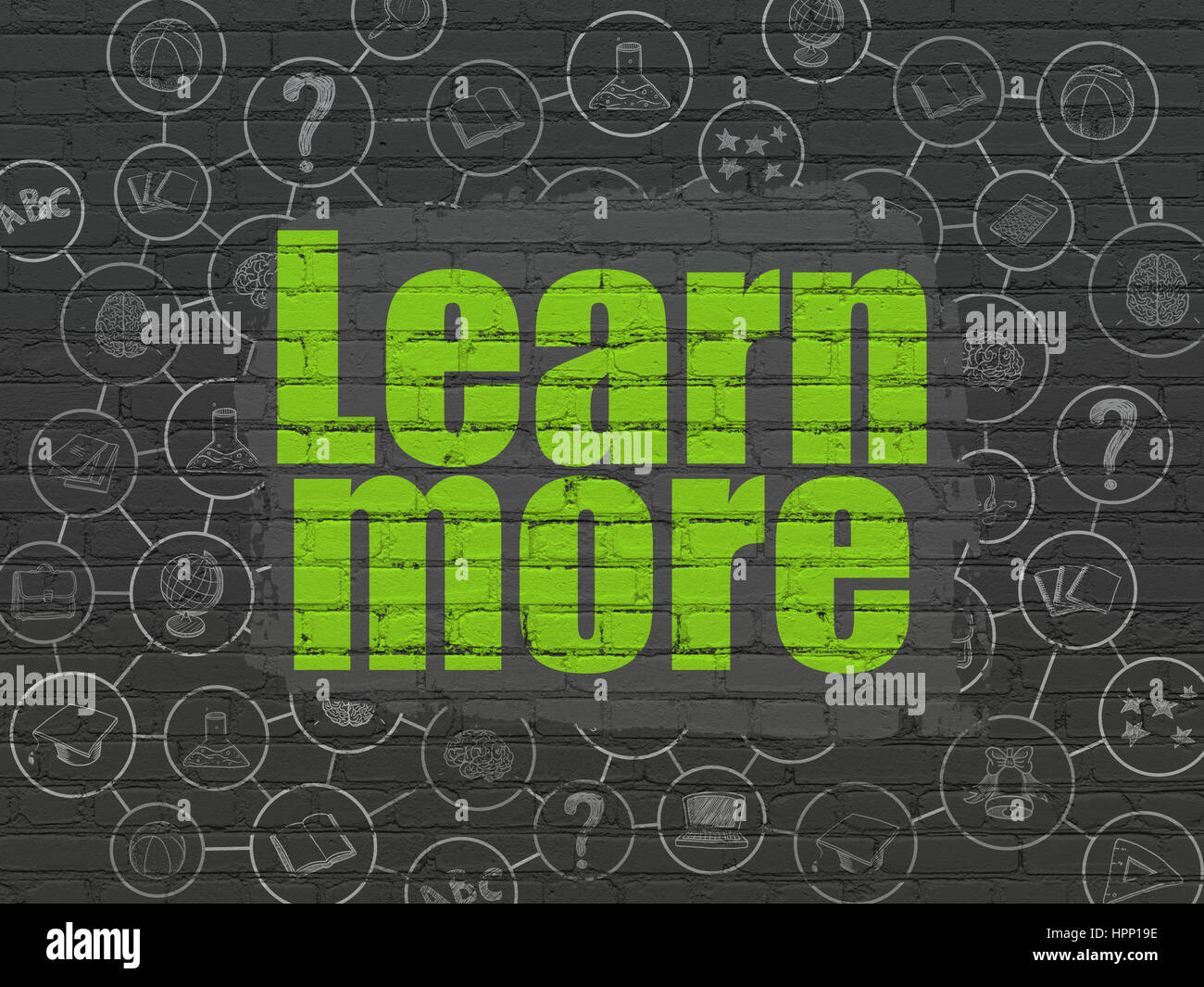 Education concept: Learn More on wall background Stock Photo - Alamy