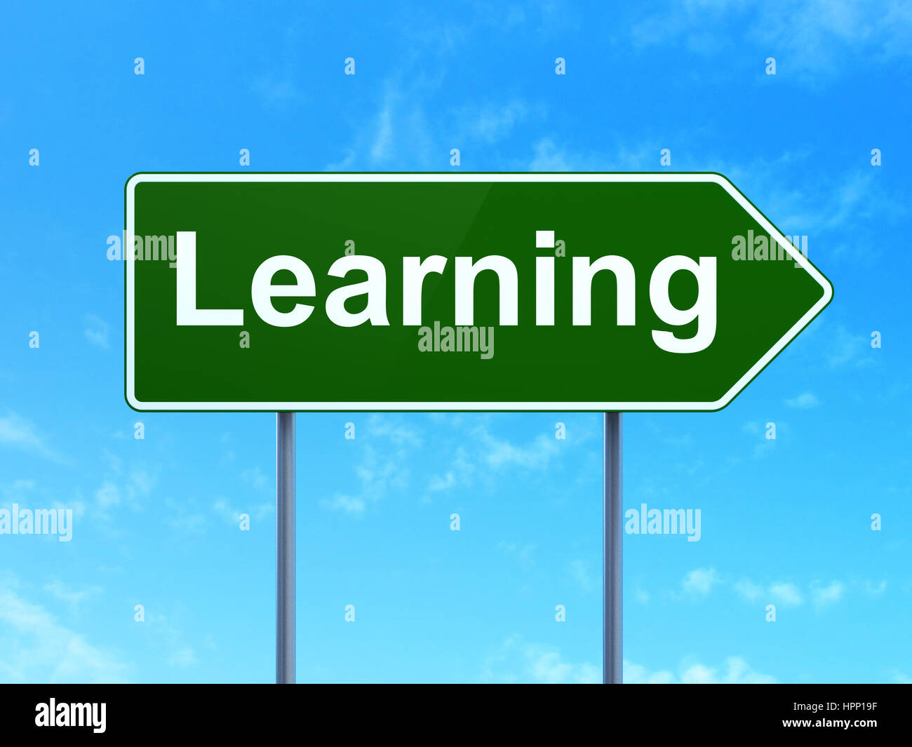 Studying concept: Learning on road sign background Stock Photo - Alamy