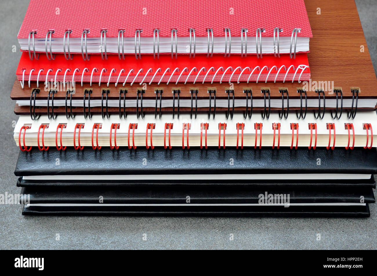 Piled elegant notebooks Stock Photo - Alamy