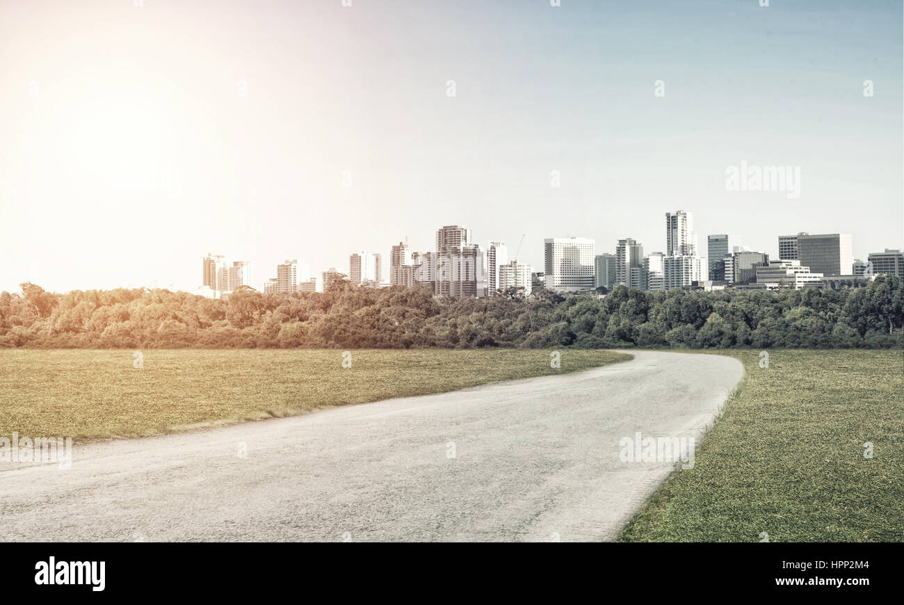 Road to big city Stock Photo - Alamy