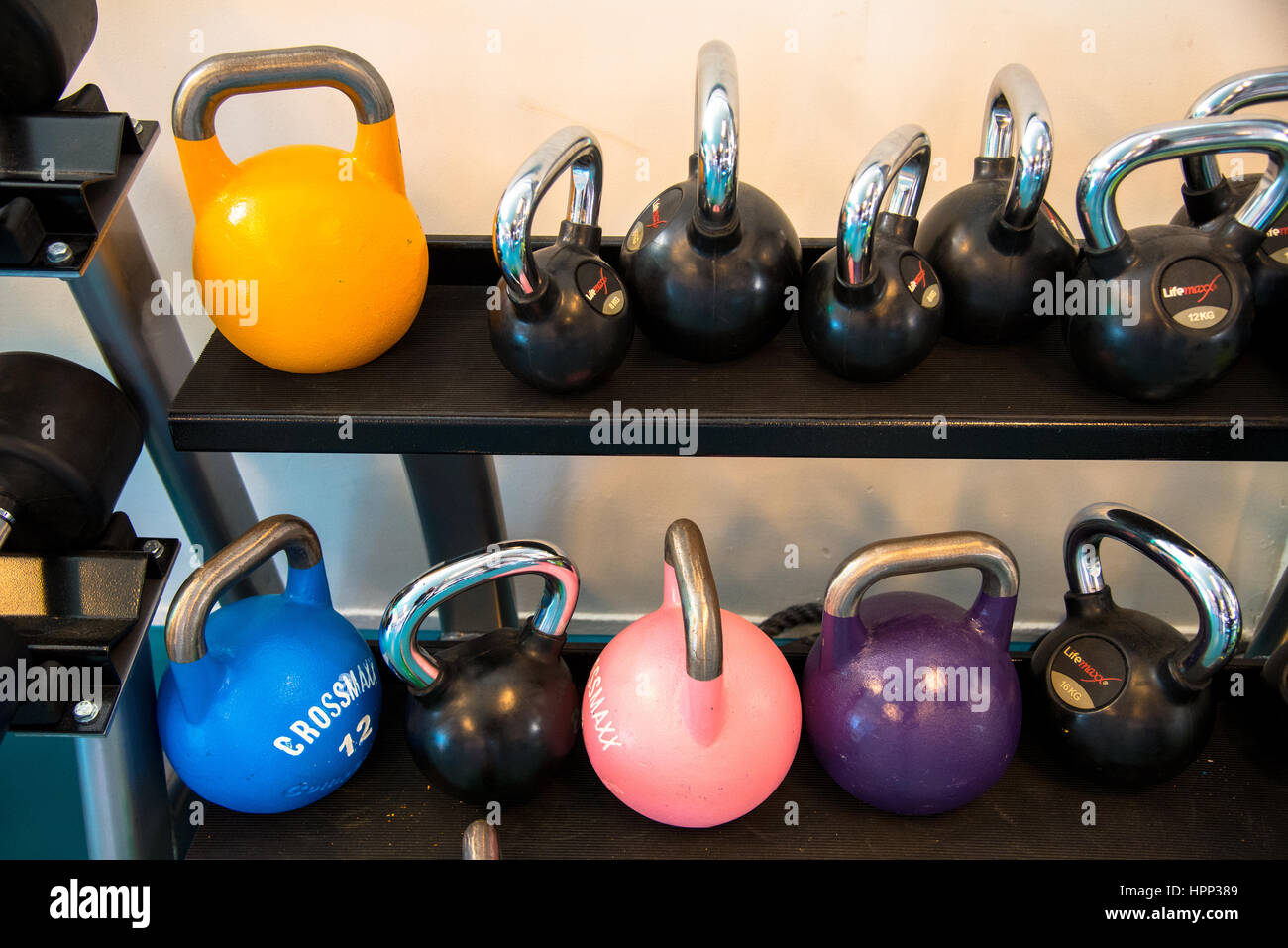 weights at sports gym Stock Photo - Alamy