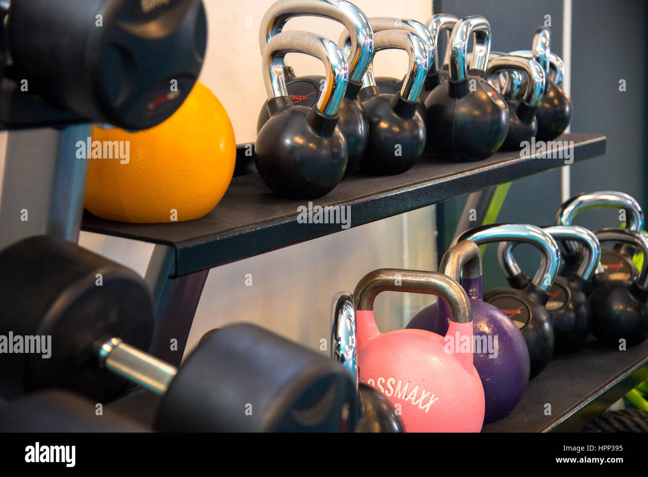 weights at sports gym Stock Photo - Alamy