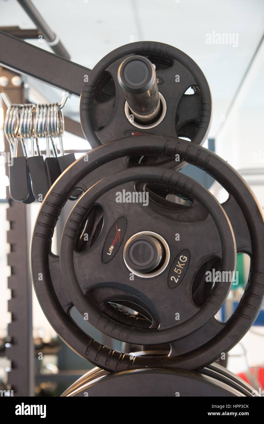 weights at sports gym Stock Photo - Alamy