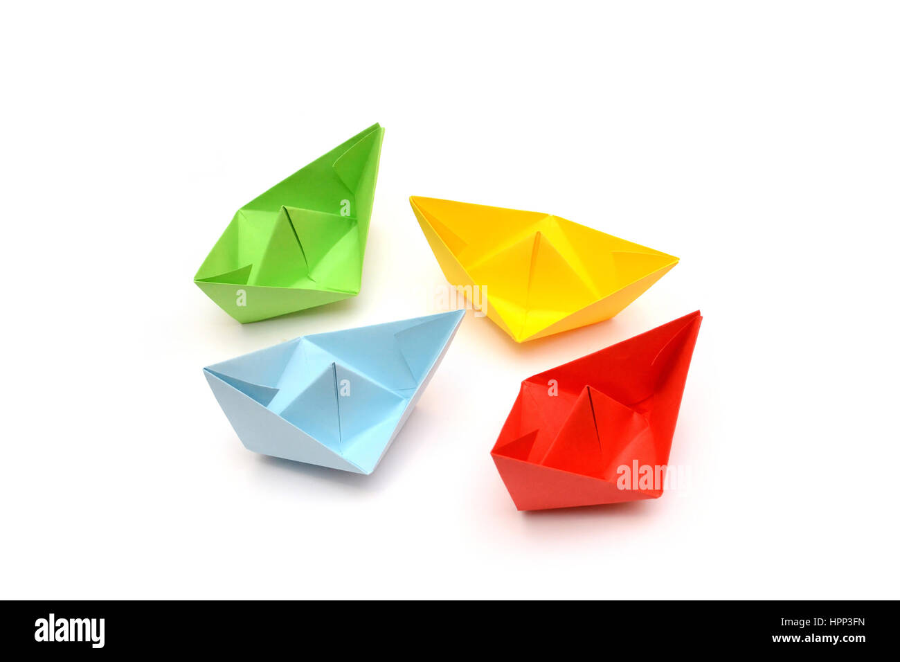 Colored paper boats, origami isolated on white background Stock Photo ...