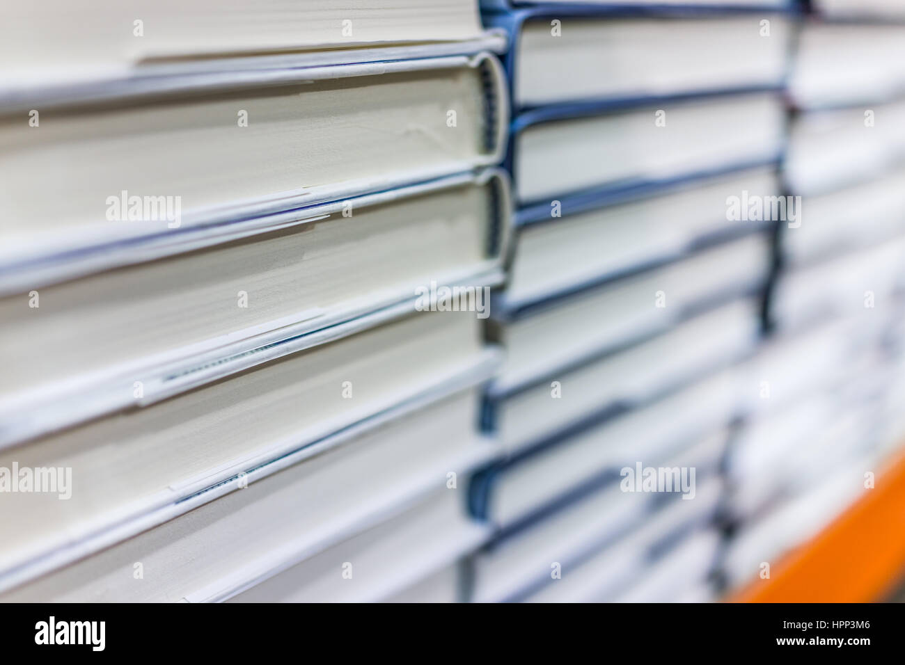 Stack of new books on shelf on display in store Stock Photo - Alamy