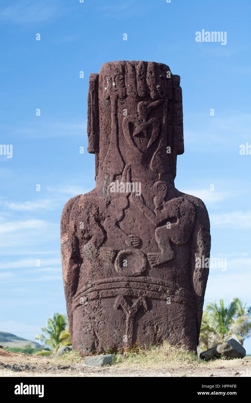 Easter Island moai with birdman petroglyphs carved on his back Stock ...