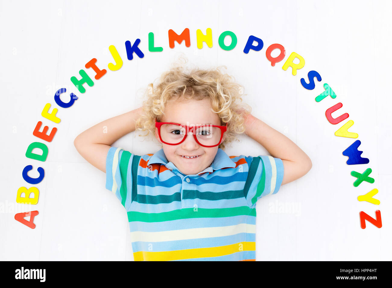 Happy kids alphabet classroom hi-res stock photography and images - Alamy