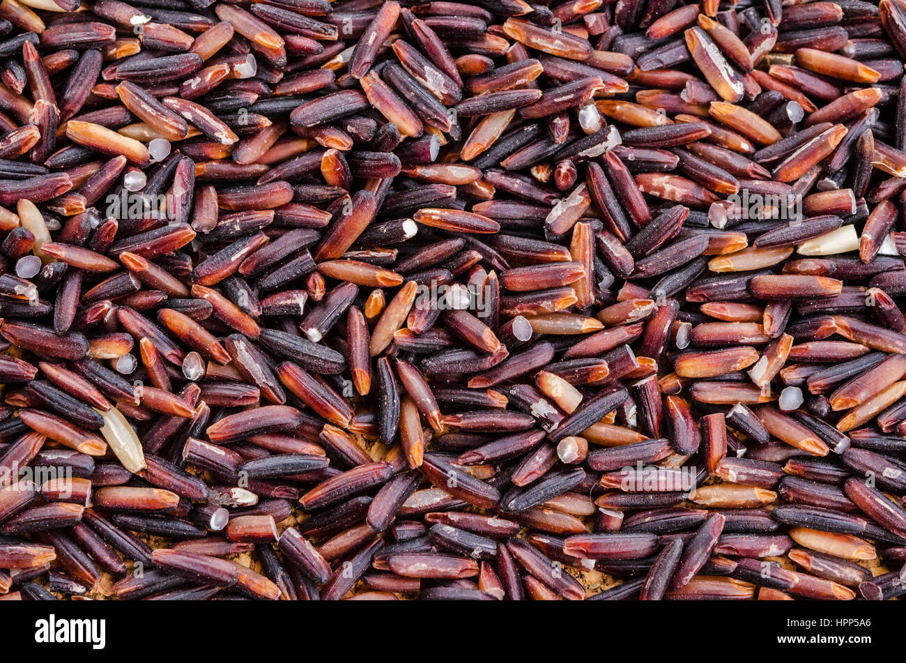 Raw Rice berry texture as background Stock Photo - Alamy