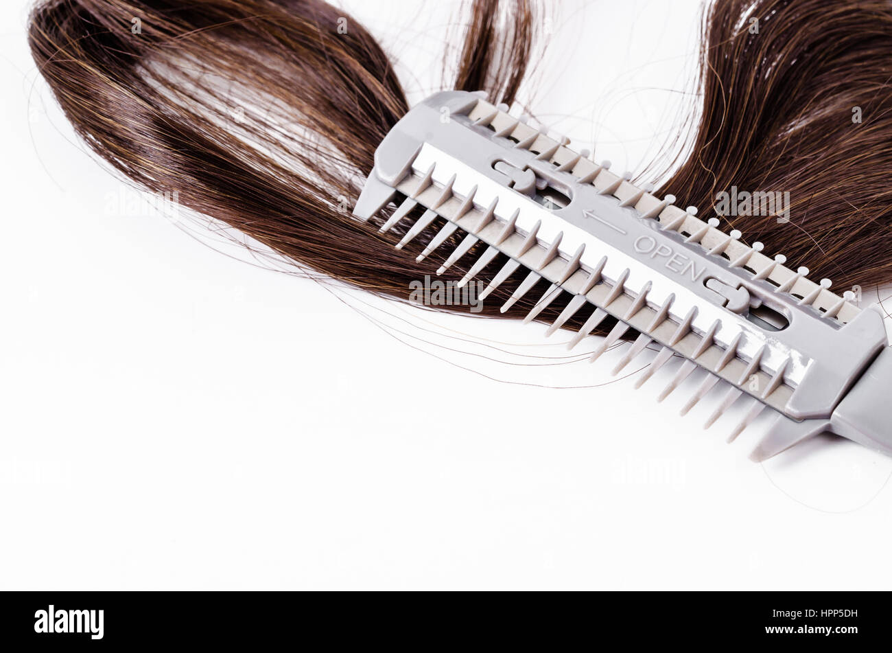 Comb slice hair with blade and hairs on white background Stock Photo ...