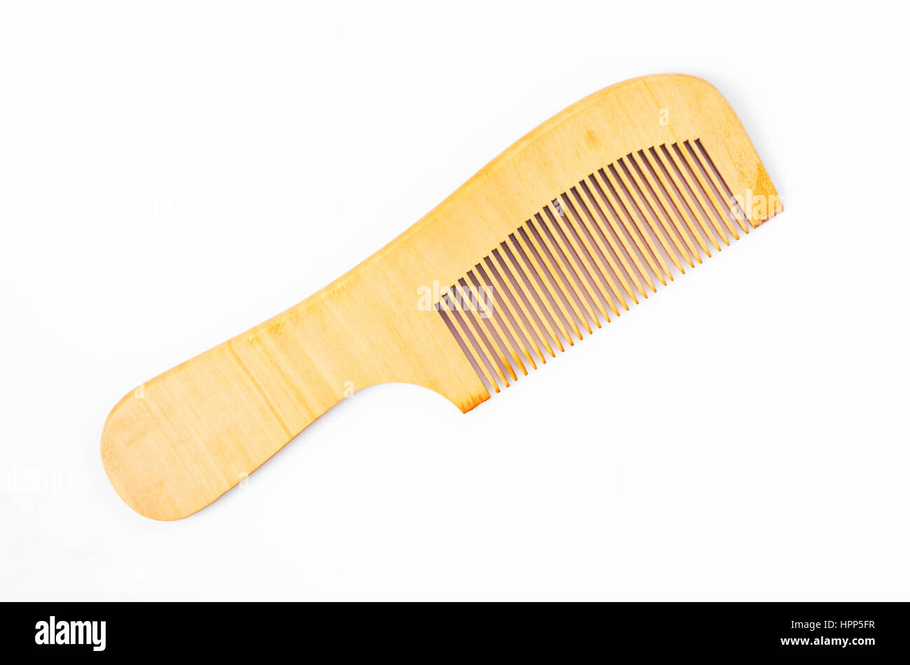 wooden comb isolated on white background Stock Photo - Alamy