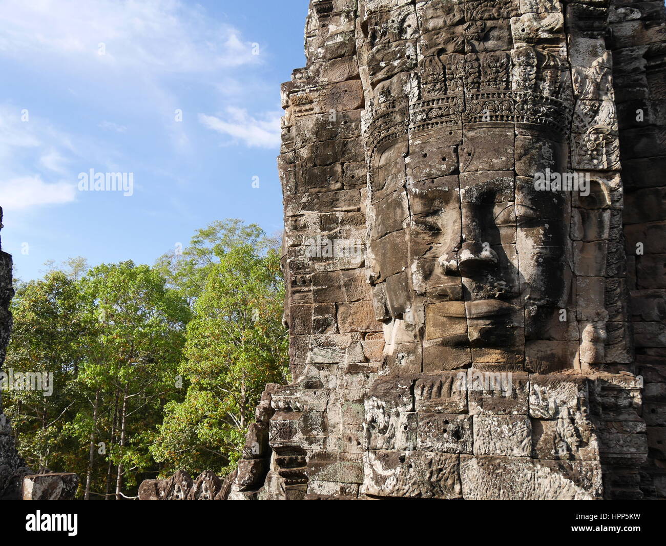 Angkor wat temple faces hi-res stock photography and images - Alamy