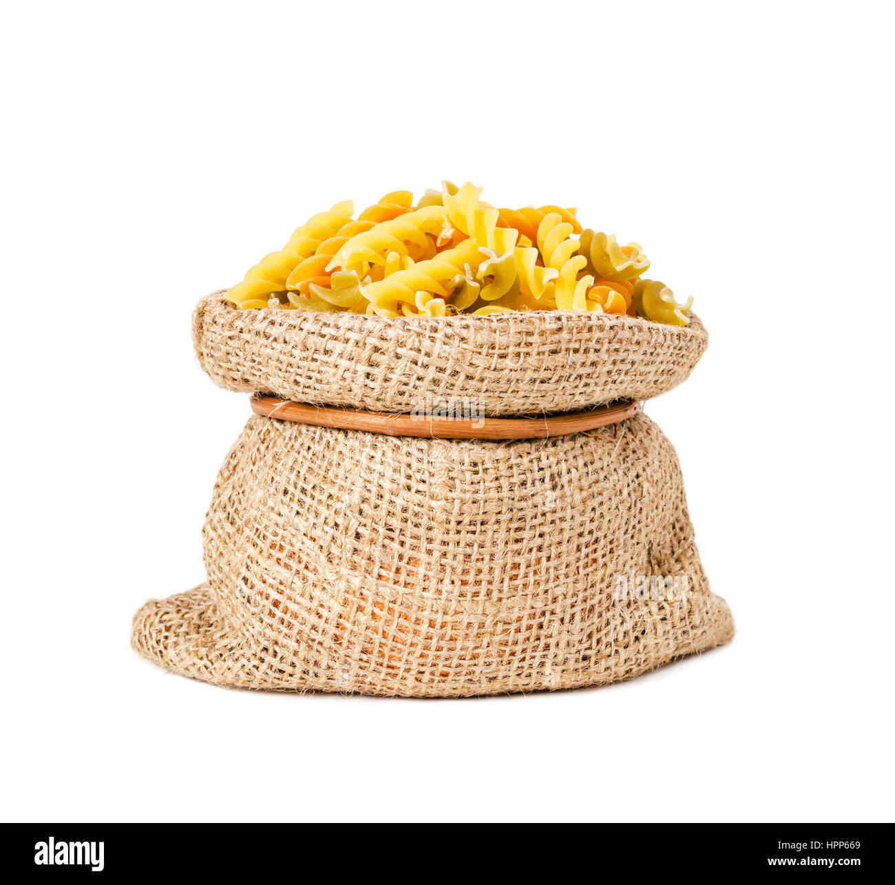 Colorful raw macaroni in sack bag isolated on white background Stock ...