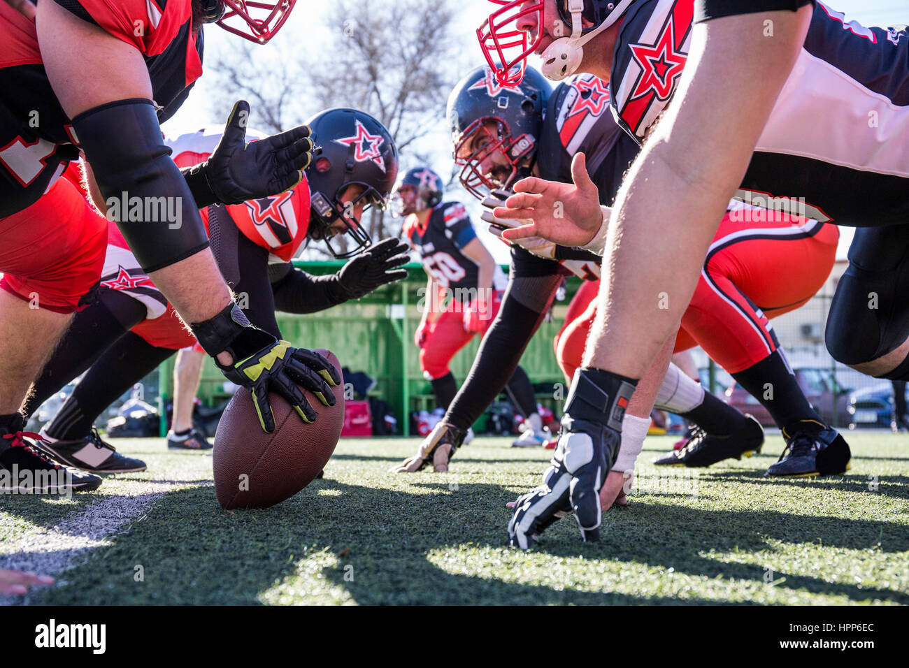 American football players on the line of scrimmage during a match Stock ...