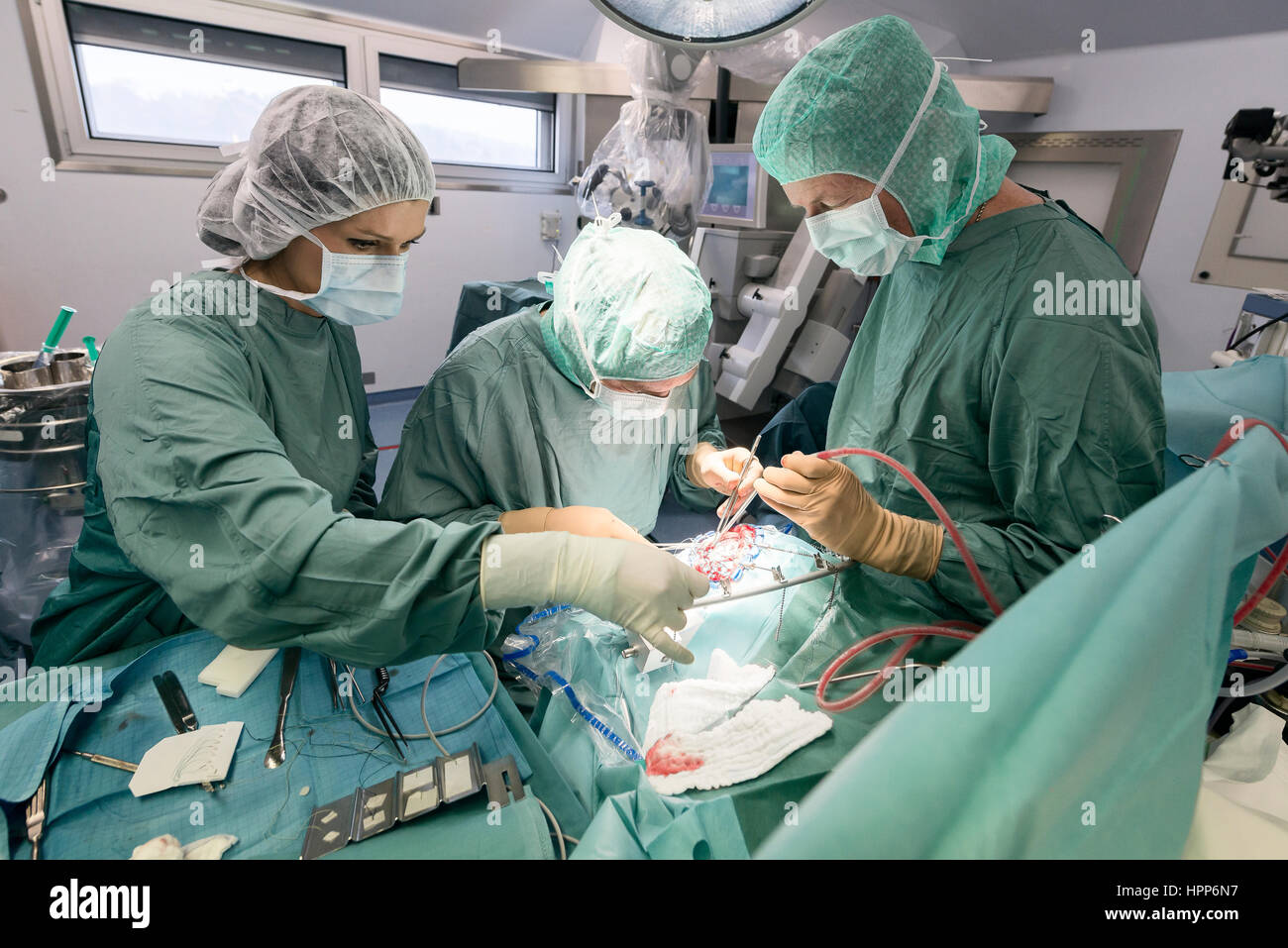 Neurosurgeons opening the cranium during an operation Stock Photo - Alamy