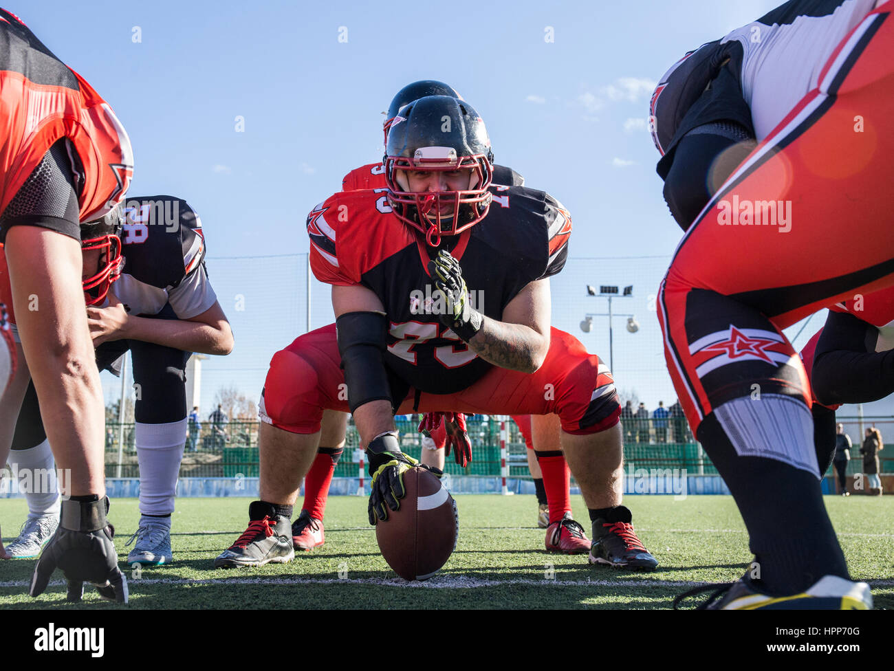 American football players on the line of scrimmage during a match Stock ...