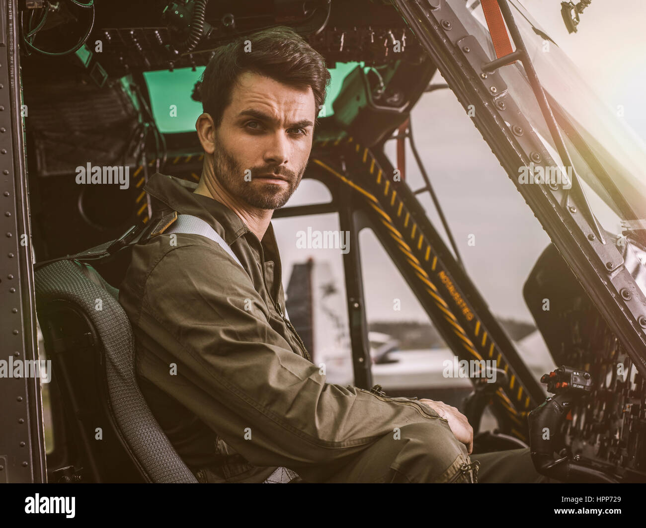 Portrait of pilot in cockpit of a helicopter Stock Photo - Alamy
