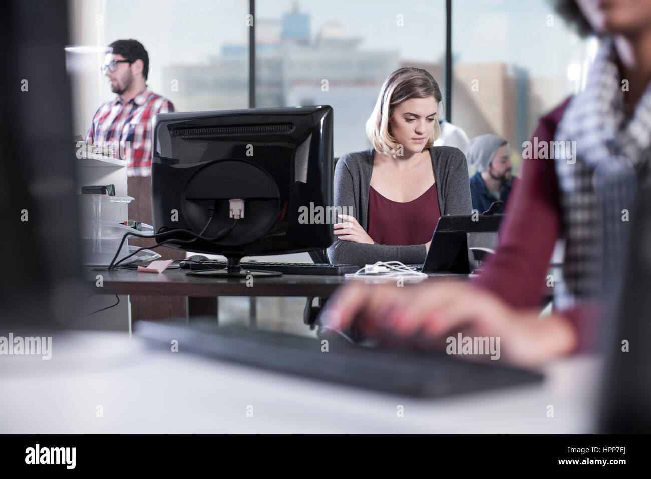 People working in office Stock Photo - Alamy