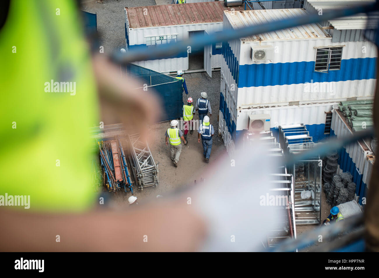Top view of men walking on construction site Stock Photo - Alamy