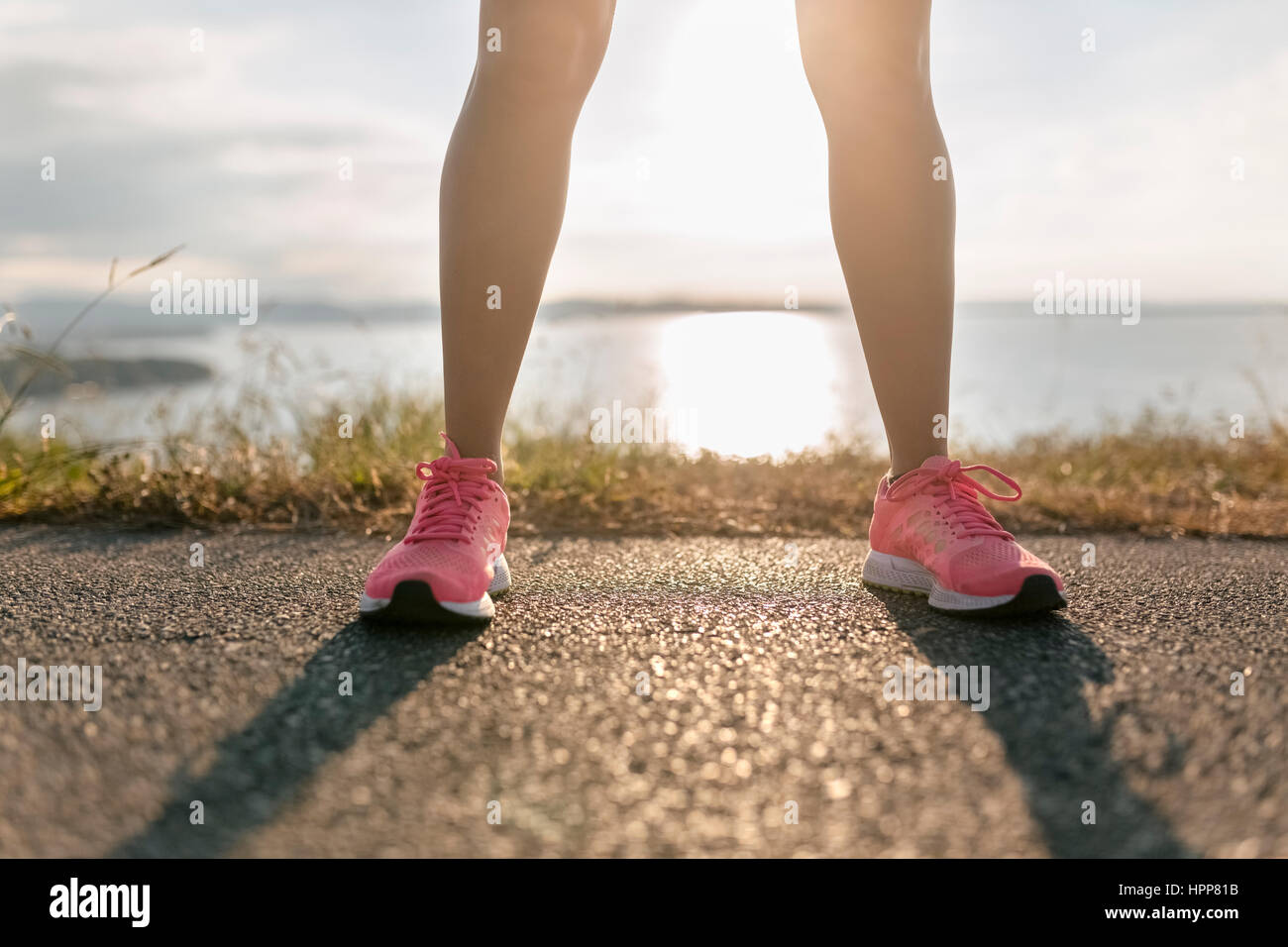 Legs of a running woman Stock Photo - Alamy