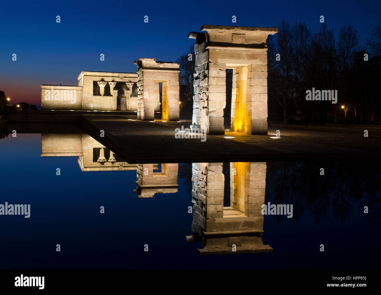 Spain, Madrid, Temple of Debod with water reflection at night Stock ...