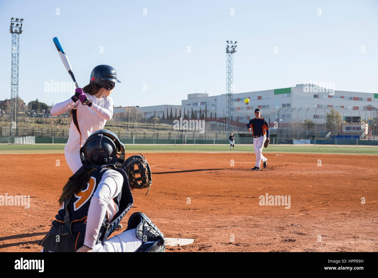 Female batter ready to hit the ball during a baseball game Stock Photo ...