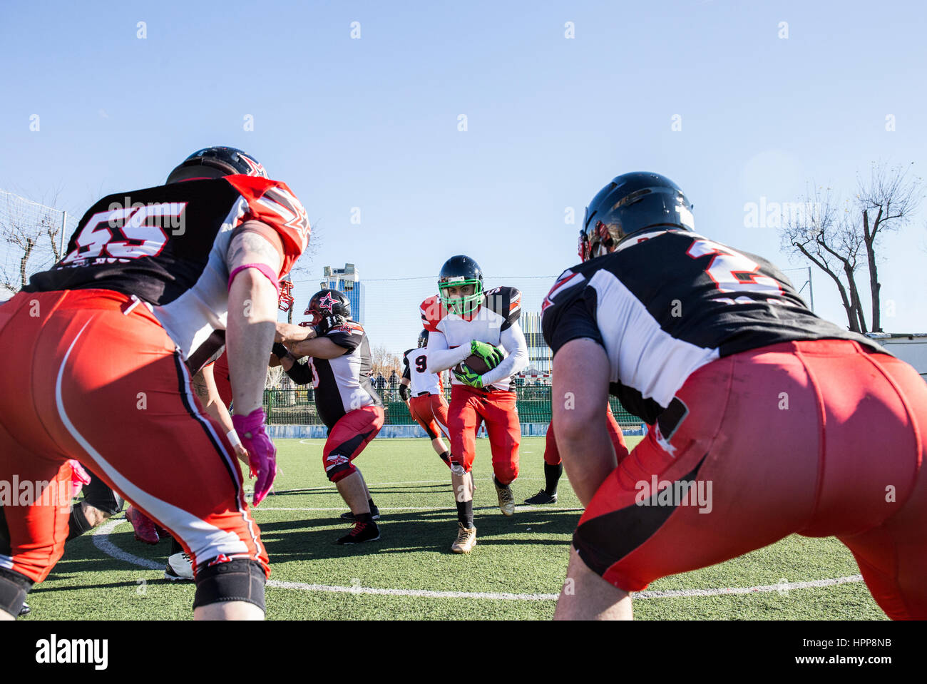 American football player running with the ball during a match Stock ...
