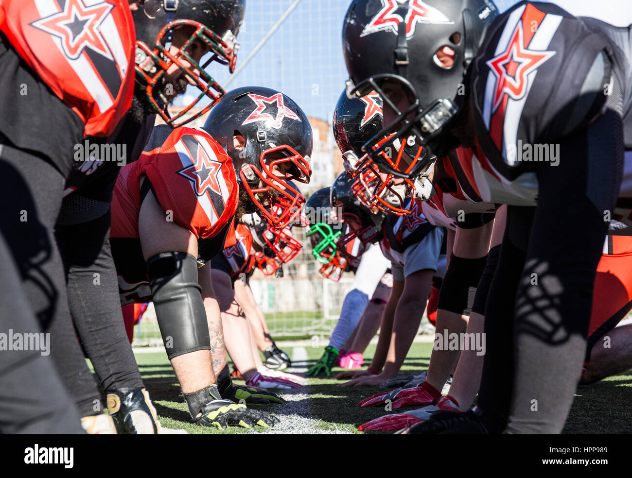 American football players on the line of scrimmage during a match Stock ...