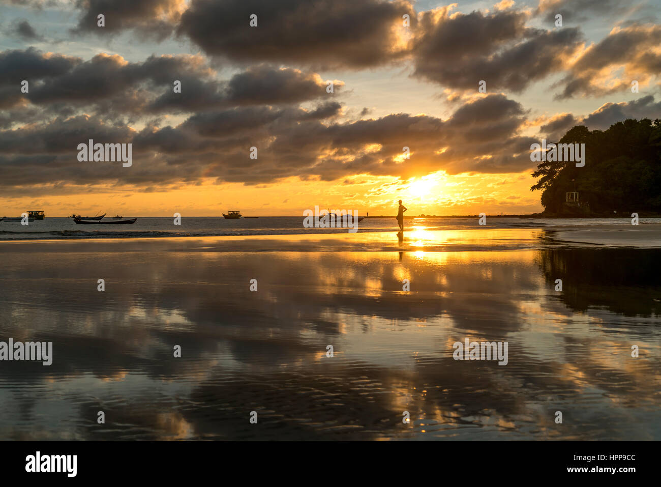 Myanmar, sunset at beach of Ngwesaung Stock Photo - Alamy