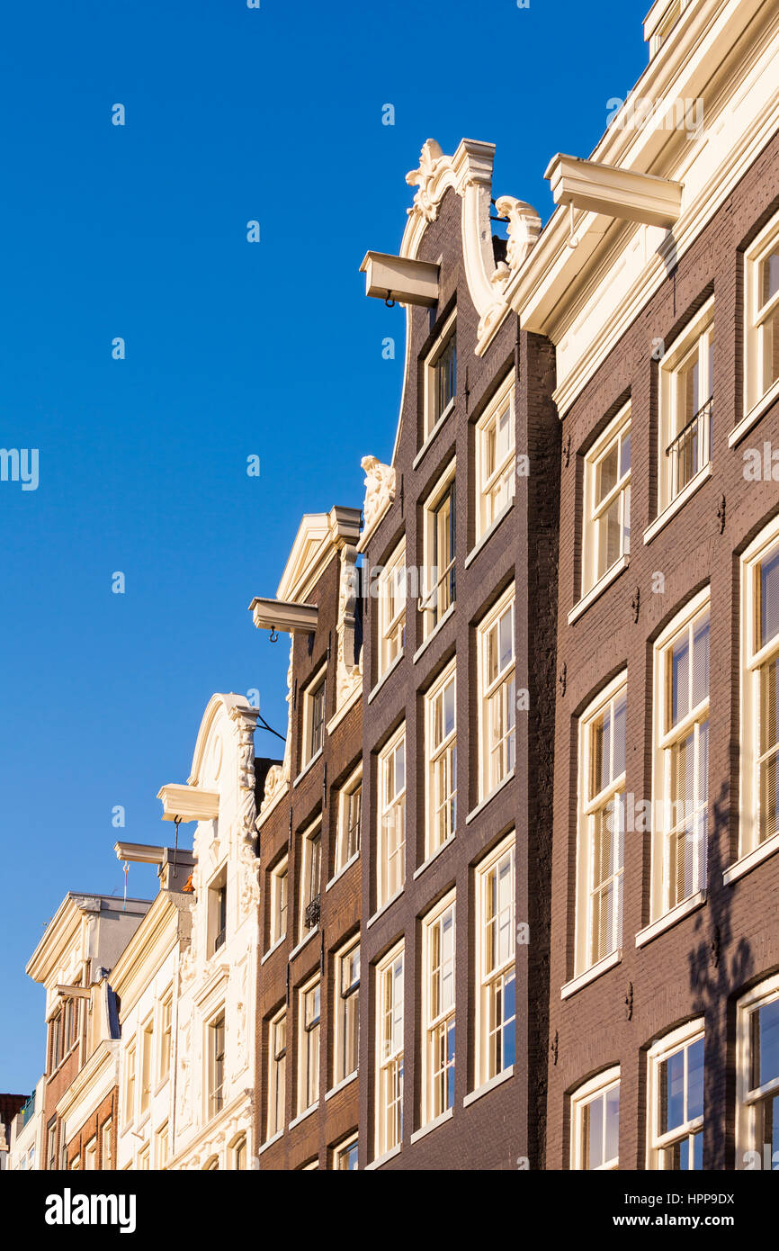 Amsterdam row of houses architecture hi-res stock photography and ...