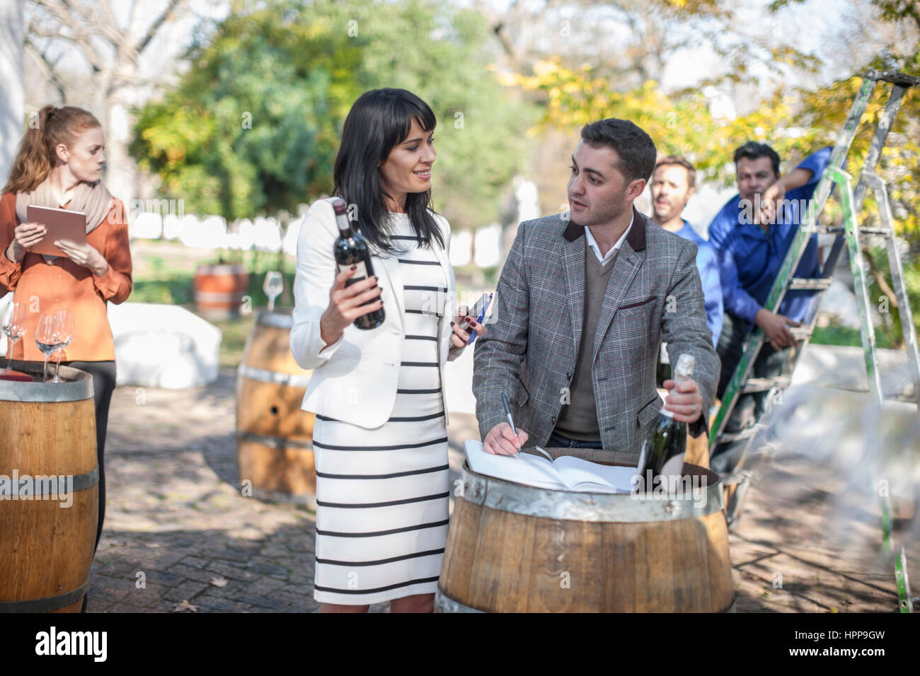 Sales people preparing wine selling event at wine estate Stock Photo ...