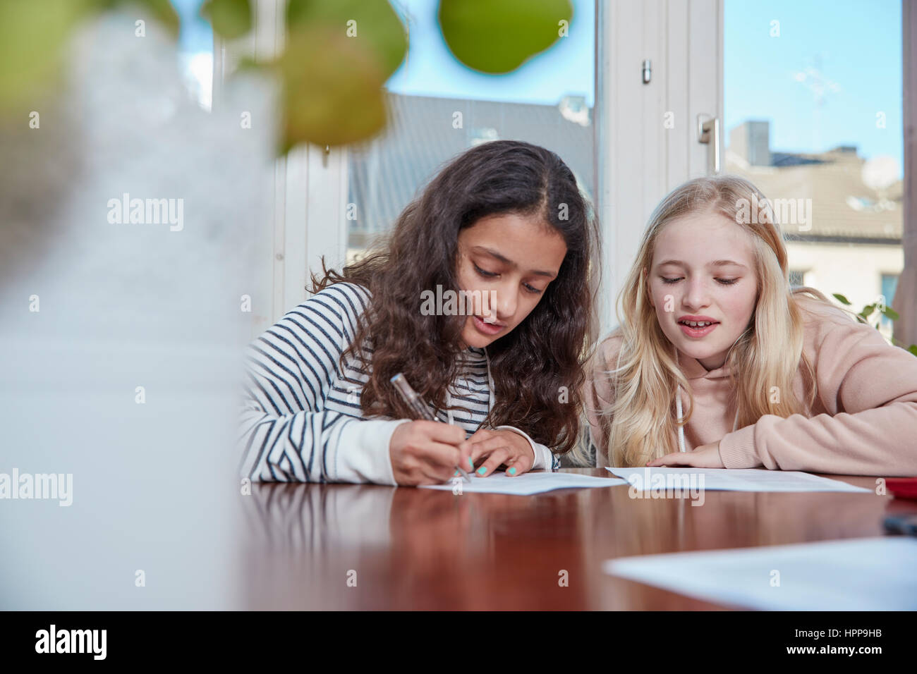 Girl girls female explaining teaching hi-res stock photography and ...