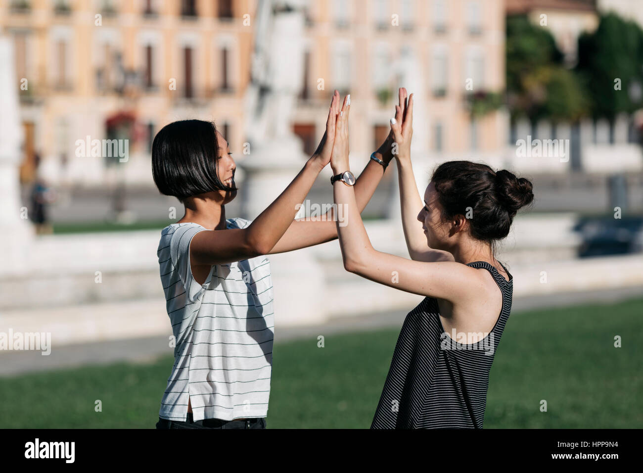 Italy, Padua, two best friends together in the city park Stock Photo ...