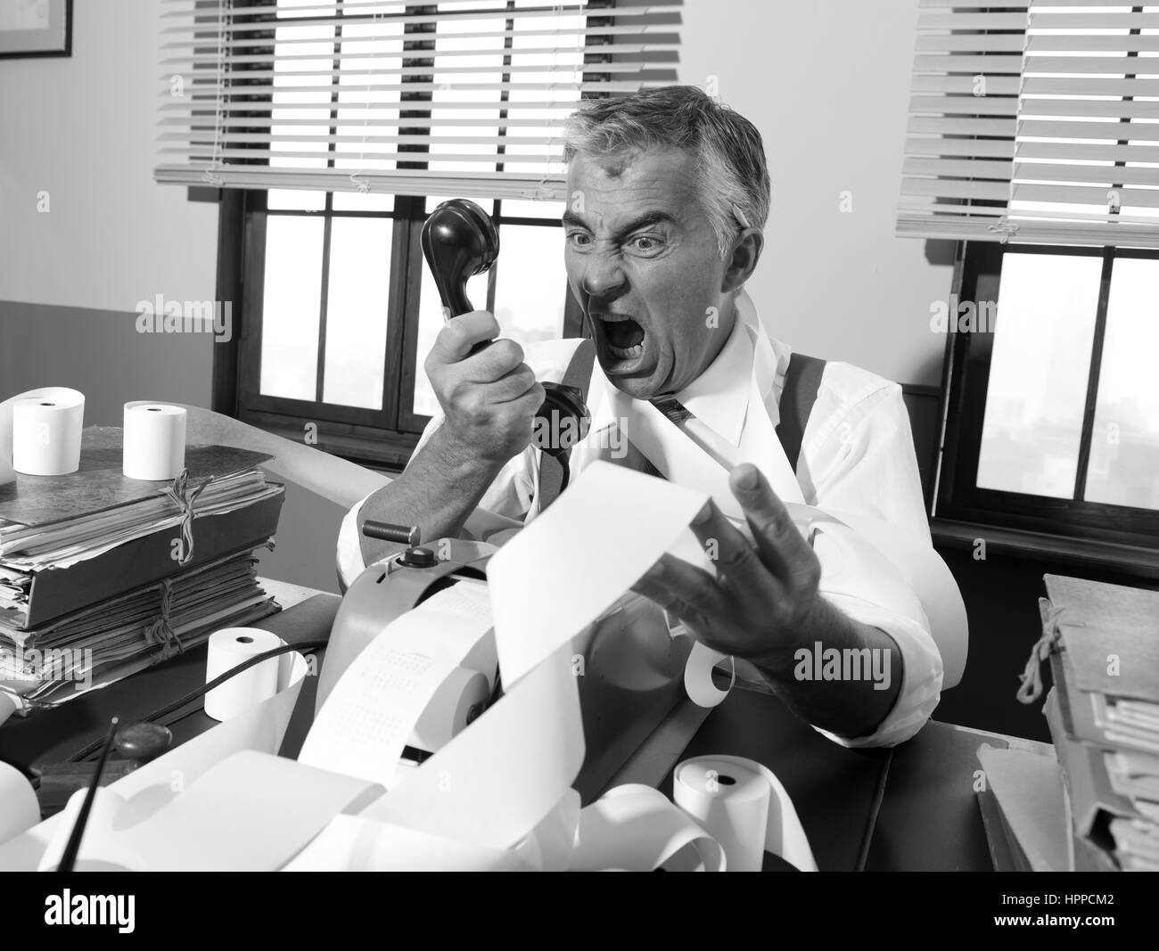 Angry vintage businessman shouting out loud at phone surrounded by ...
