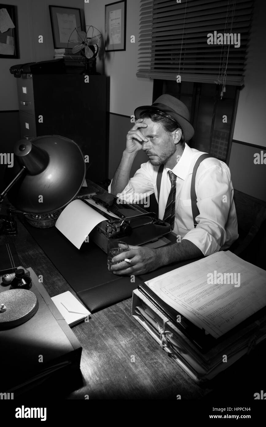Exhausted reporter working late hi-res stock photography and images - Alamy