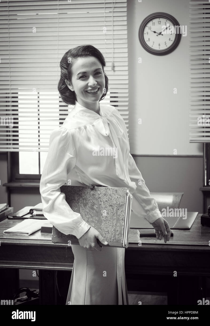 1960s woman secretary smiling desk hi-res stock photography and images ...