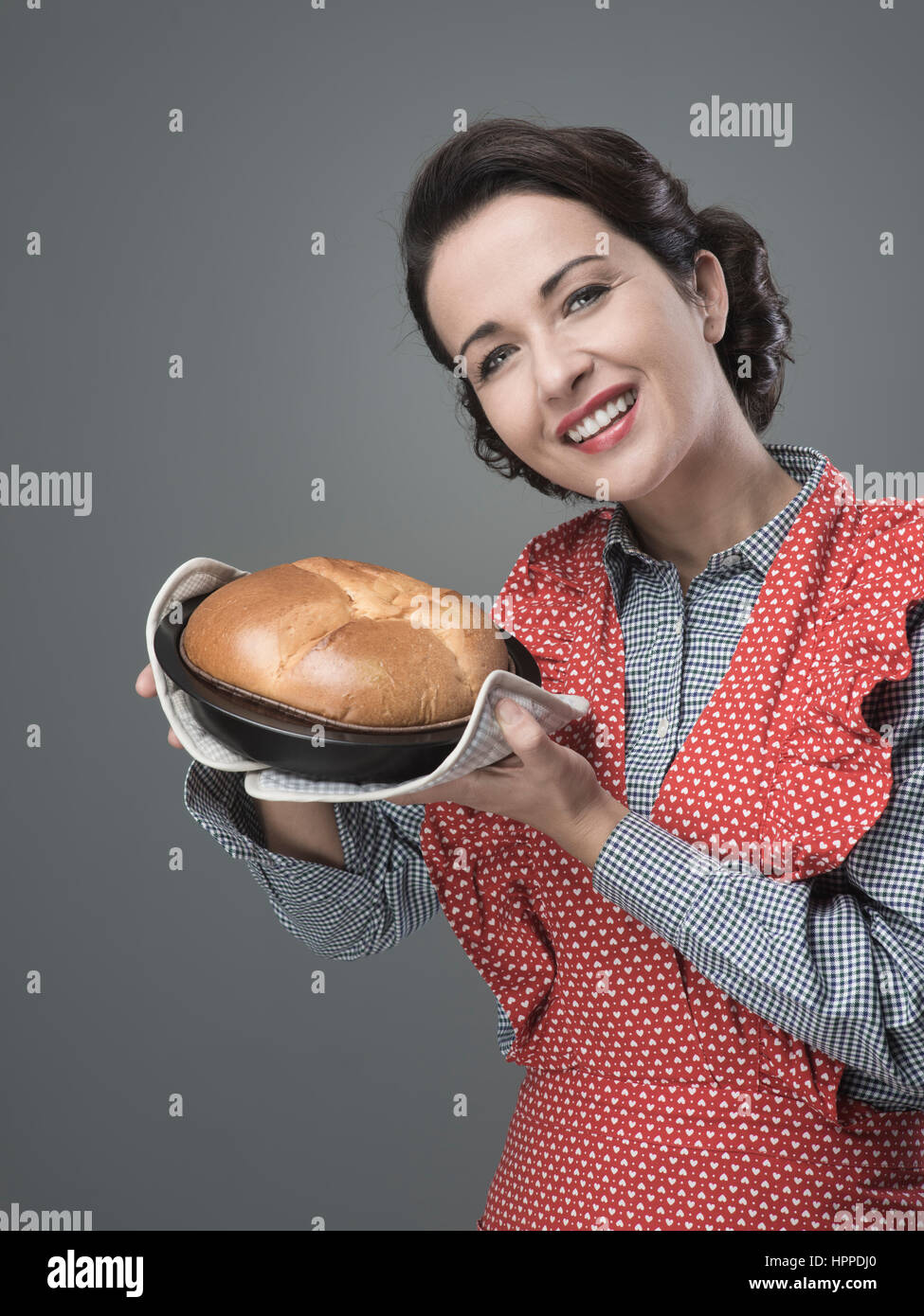 Cooking cake 1950s hi-res stock photography and images - Alamy