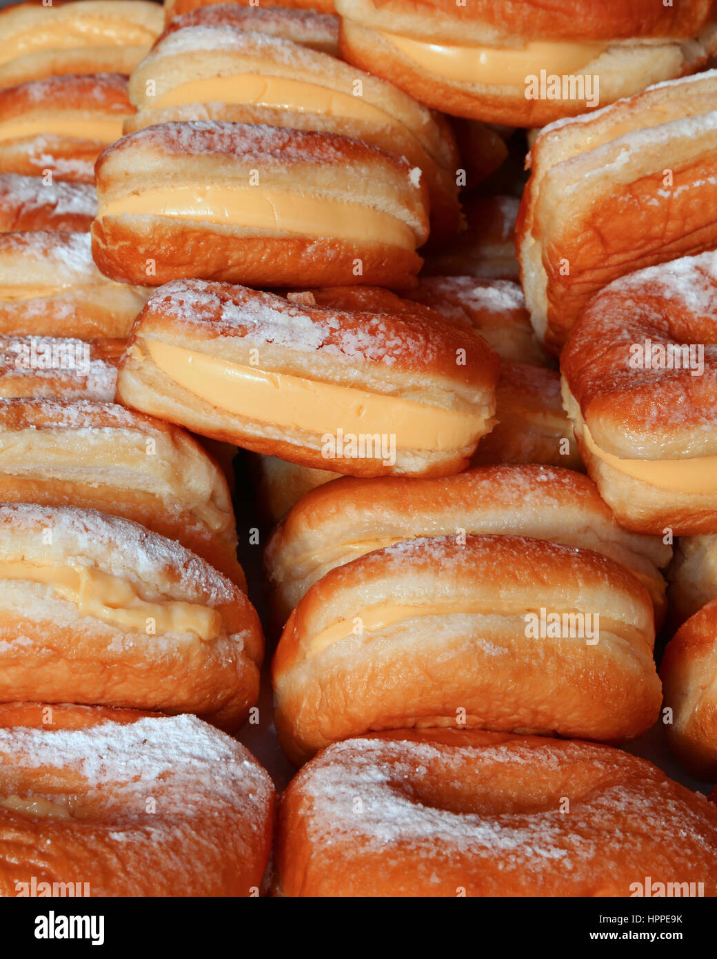 creamy donuts in a pastry with custard Stock Photo - Alamy