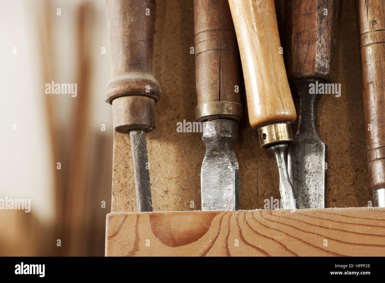 Set of carpenter tools on a wooden rack Stock Photo - Alamy