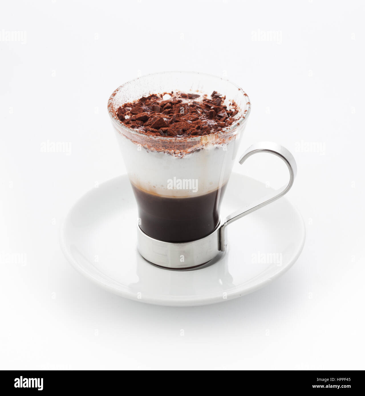 Garnished coffee with cream topping in elegant cup Stock Photo - Alamy
