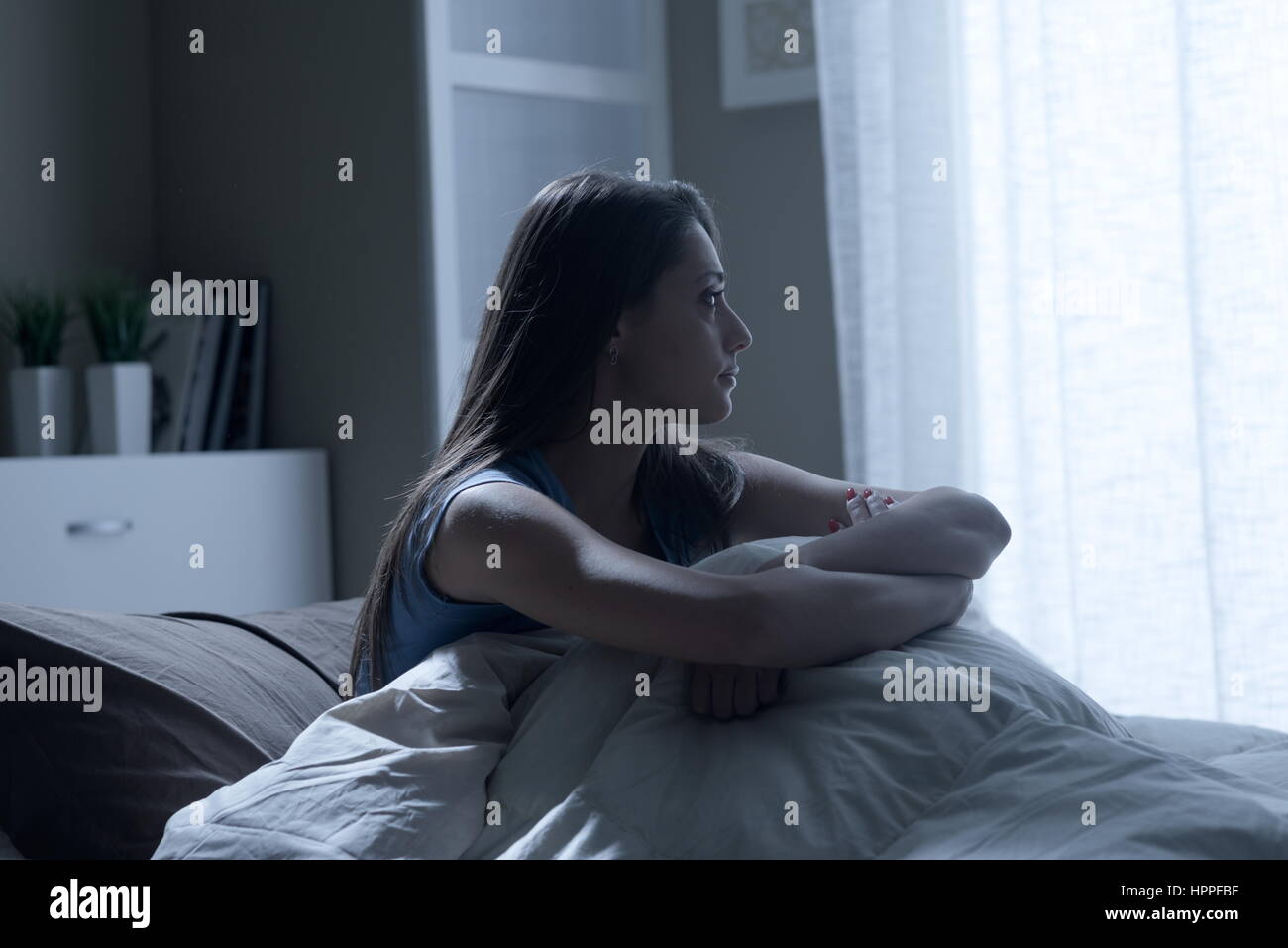 Portrait of a young woman suffering from insomnia Stock Photo - Alamy