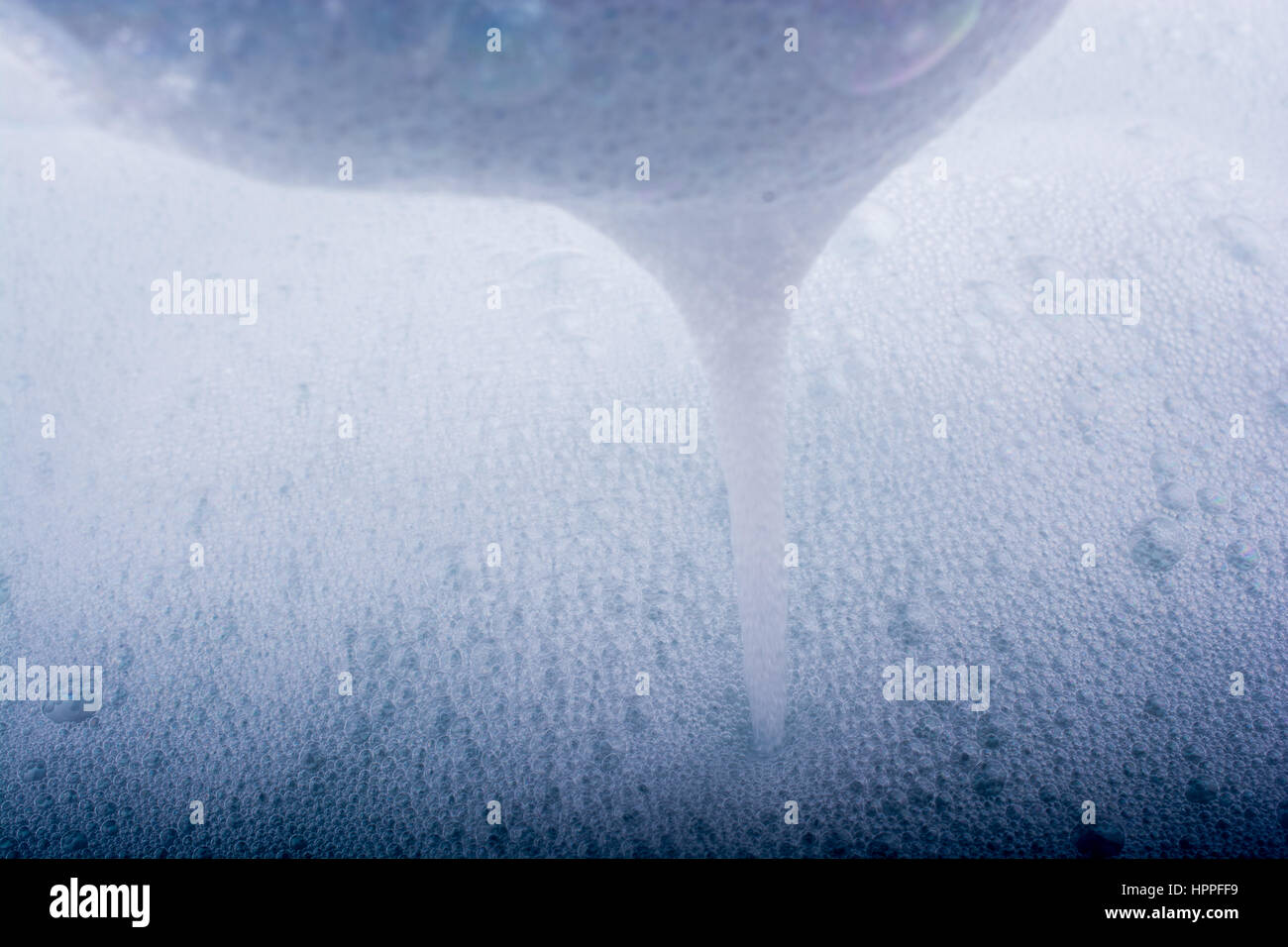 Pure water covered with foam of shampoo Stock Photo - Alamy