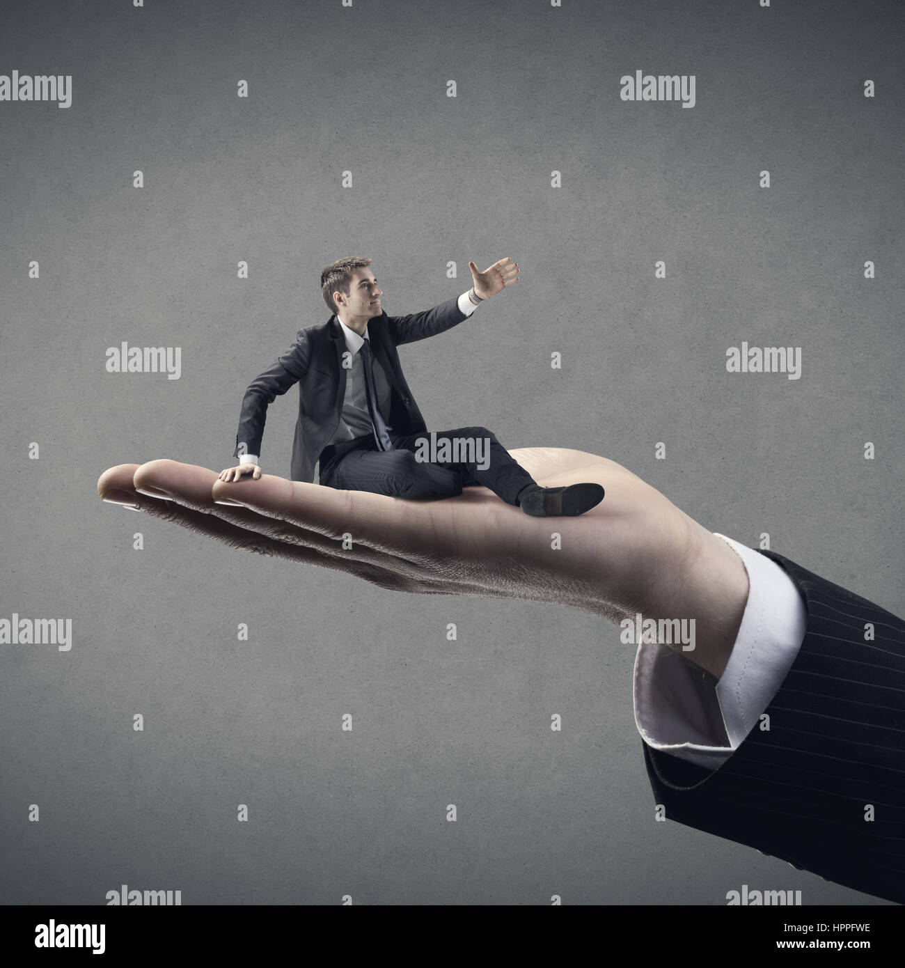 Huge hand hi-res stock photography and images - Alamy