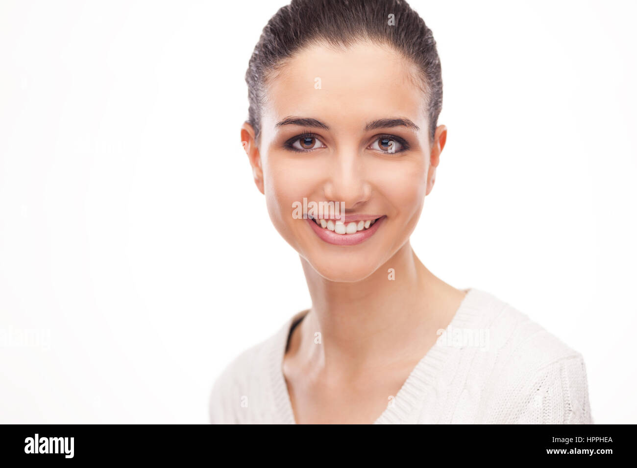 Smiling attractive woman with radiant fresh face skin posing on white ...
