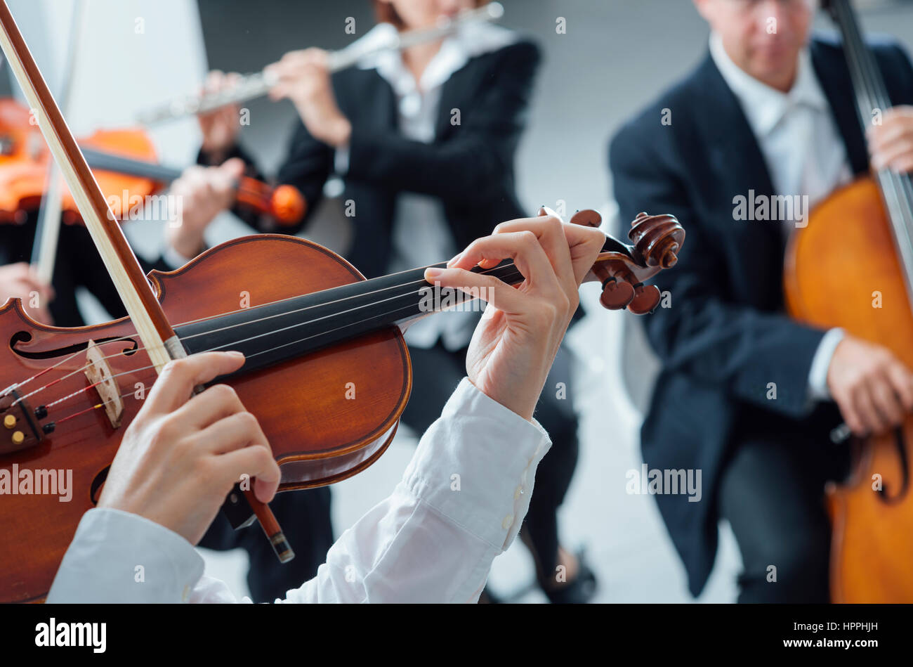 Classical music symphony orchestra string section performing, female ...