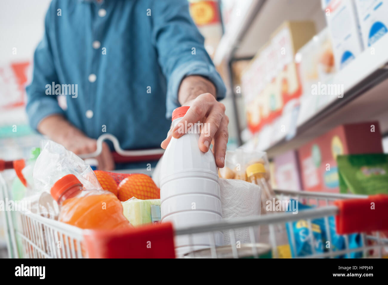 Milk in shopping trolley in hi-res stock photography and images - Alamy