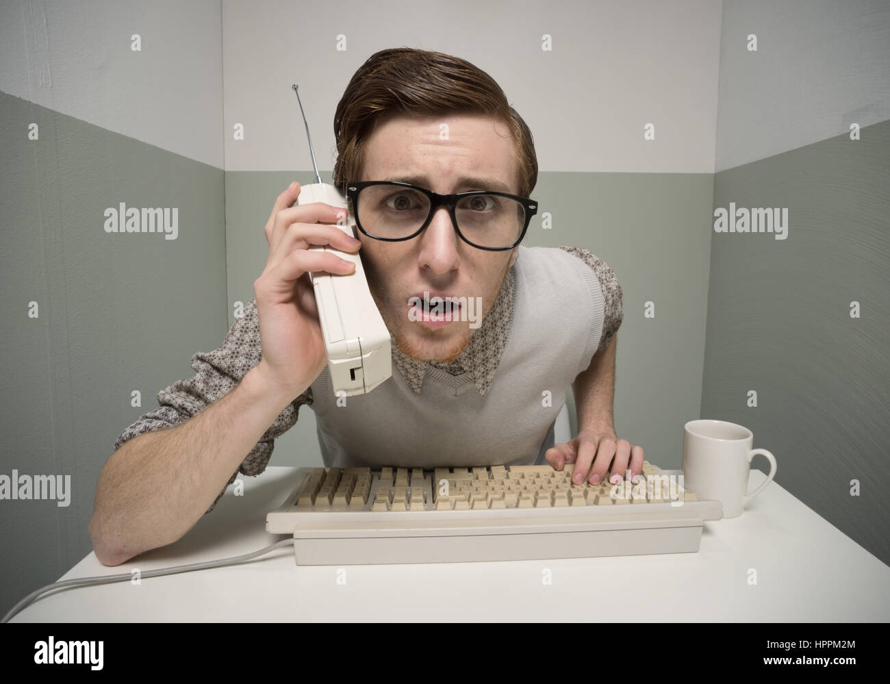 Nerd typing on keyboard hi-res stock photography and images - Alamy