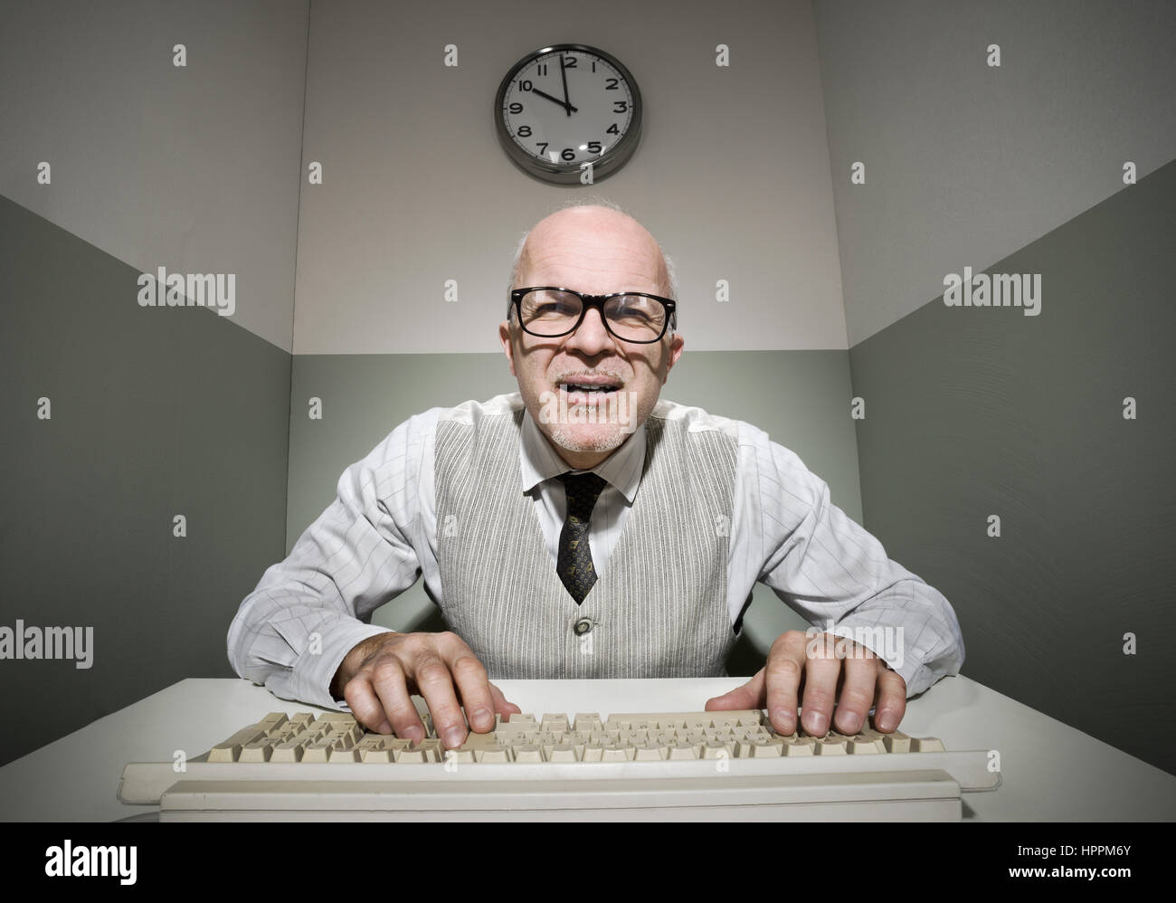 Vintage office worker typing on a computer keyboard Stock Photo - Alamy