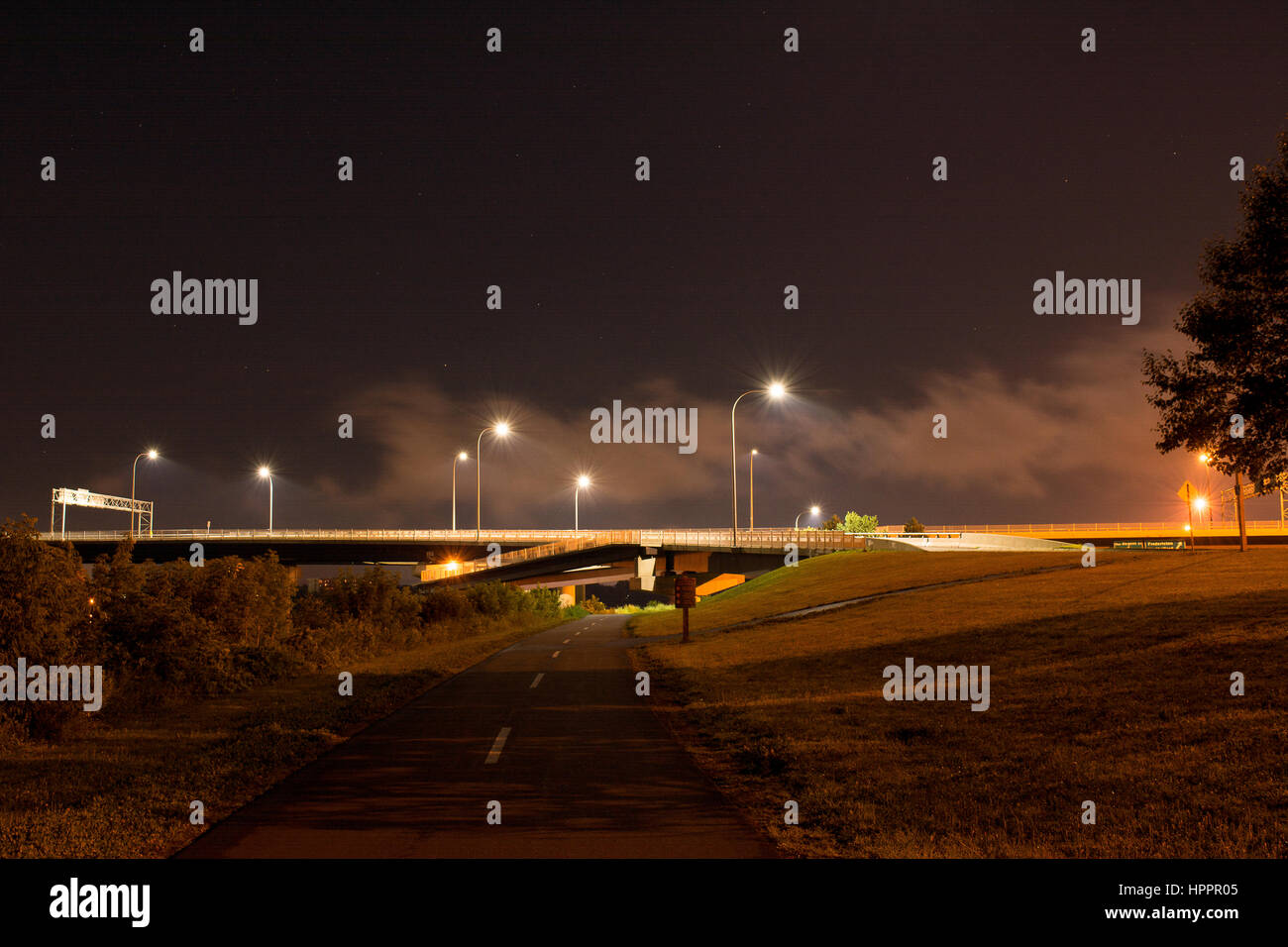 Walkway at night Stock Photo - Alamy