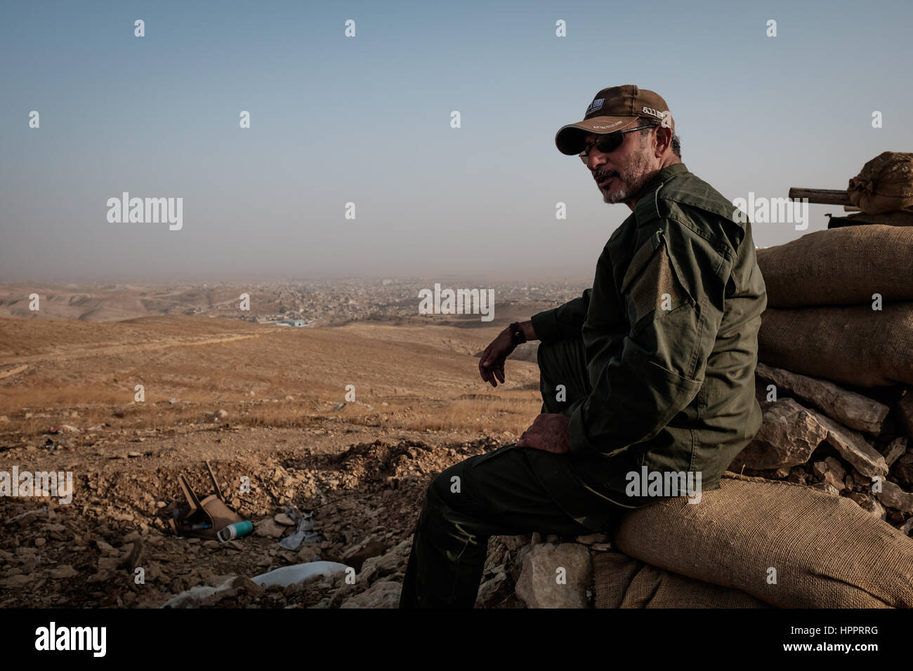 Harry Martinez looking out from a fighting position over looking the ...